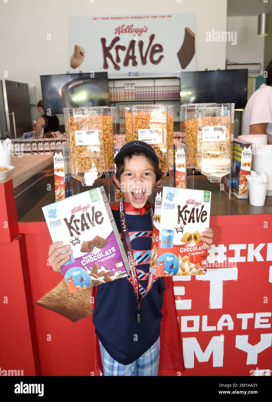Eight-year-old Noah Padilla poses with boxes of cereal at the Kellogg's ...
