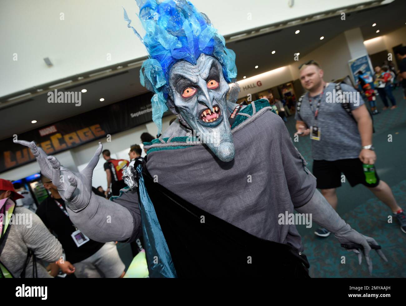 Jose Davalos, dressed as the Hades character from "Hercules," poses for ...