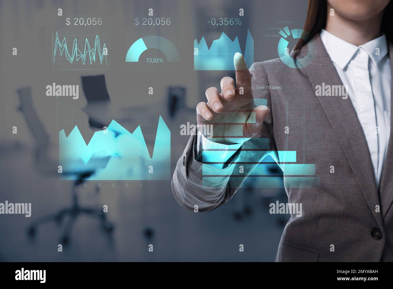 Business analytics. Woman and virtual screen with graphs in office ...