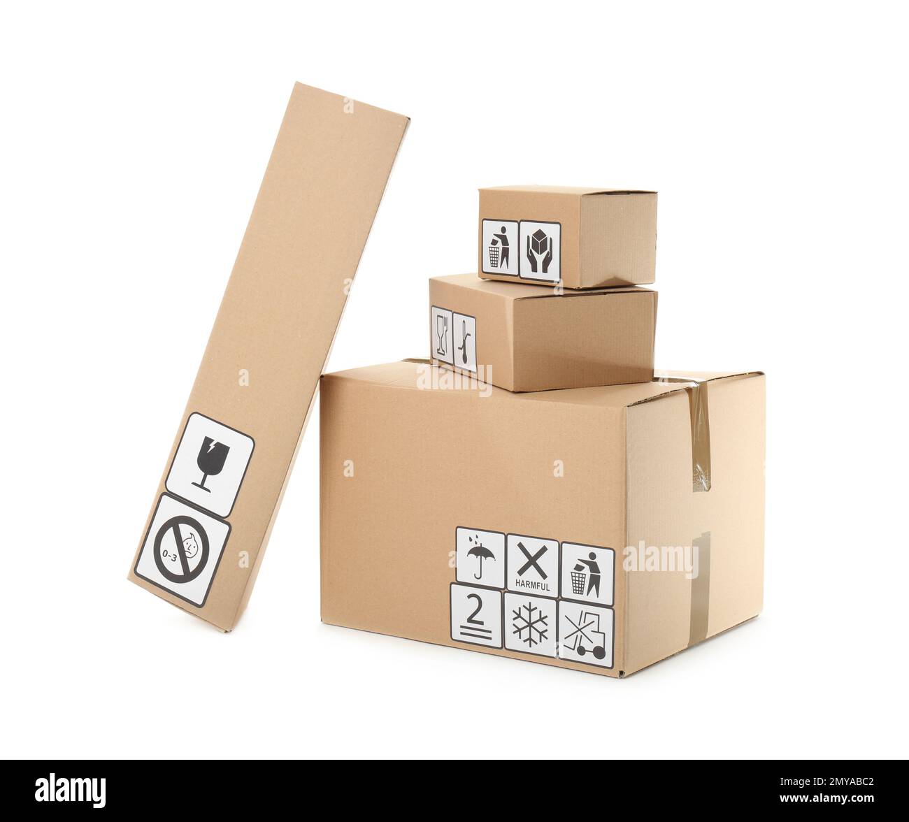 Cardboard boxes with different packaging symbols on white background ...