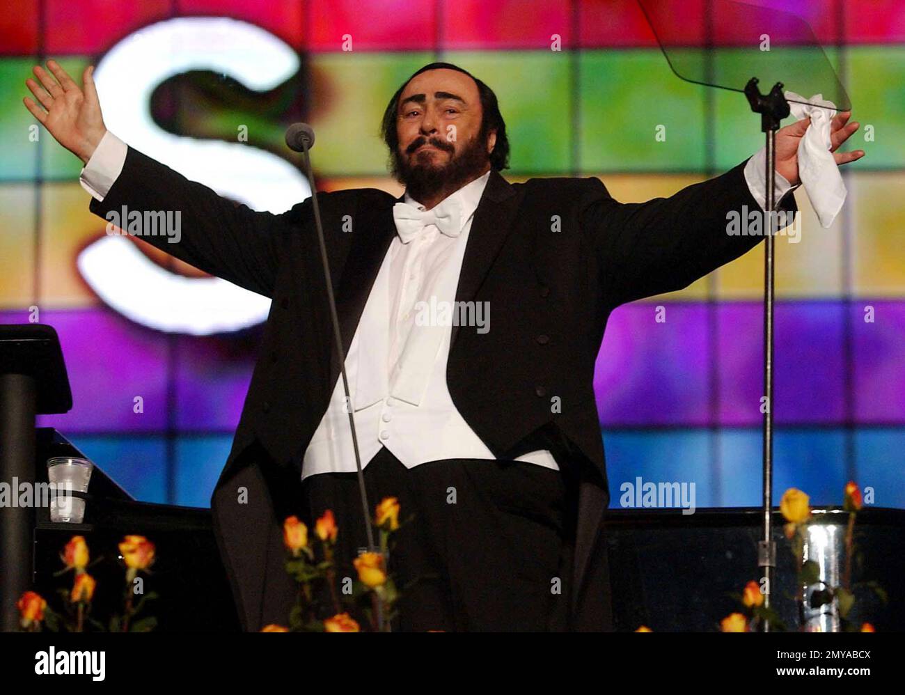 FILE -- Luciano Pavarotti bows to the audience during the Pavarotti ...