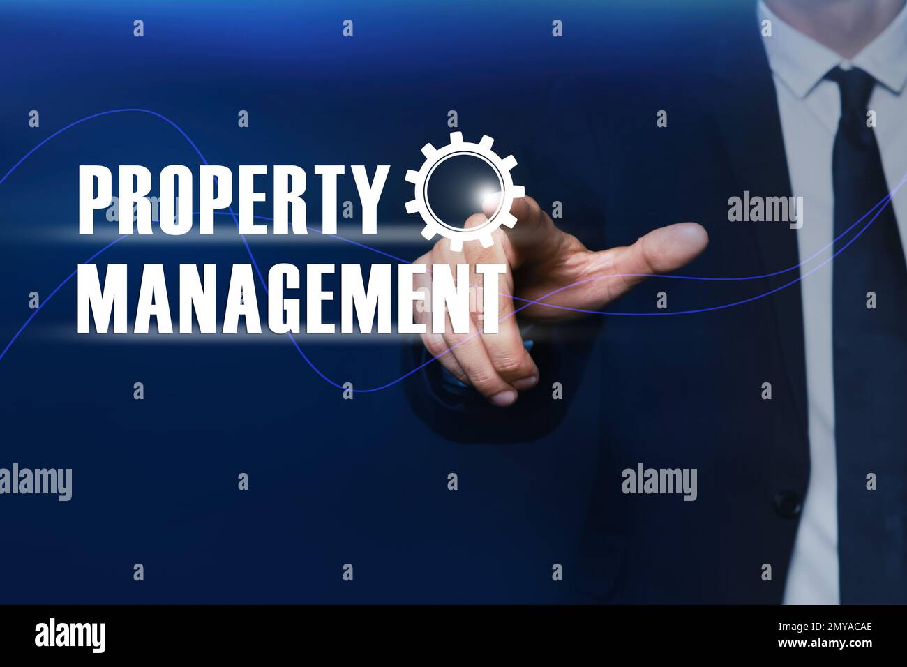 Property management concept. Man using virtual screen with gear icon ...