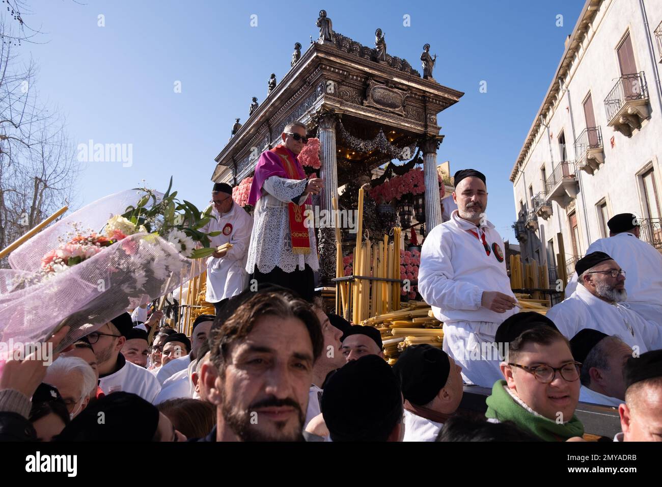 The procession with the relics of Saint Agatha seen on the street of ...