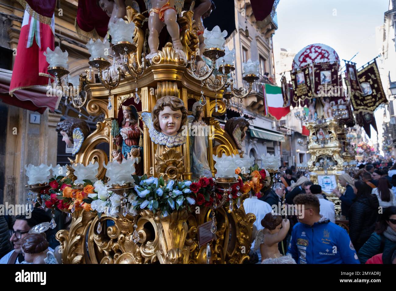 Traditional Candeloras seen standing among the crowd of people on the ...