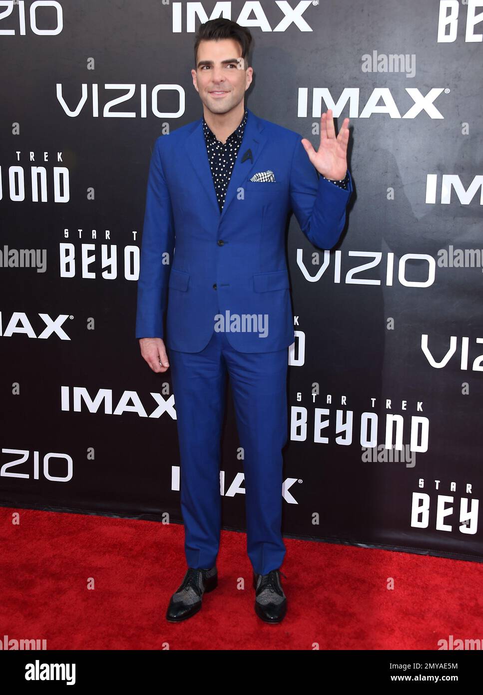 Zachary Quinto gives the Vulcan salute as he arrives at the world ...