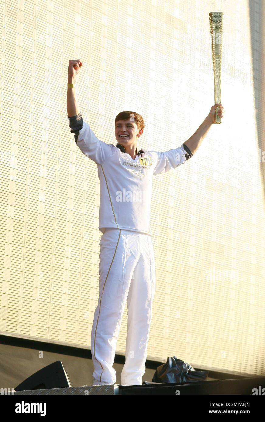 London, UK. Tyler Rix lights the Ceremonial Cauldron with the Olympic ...
