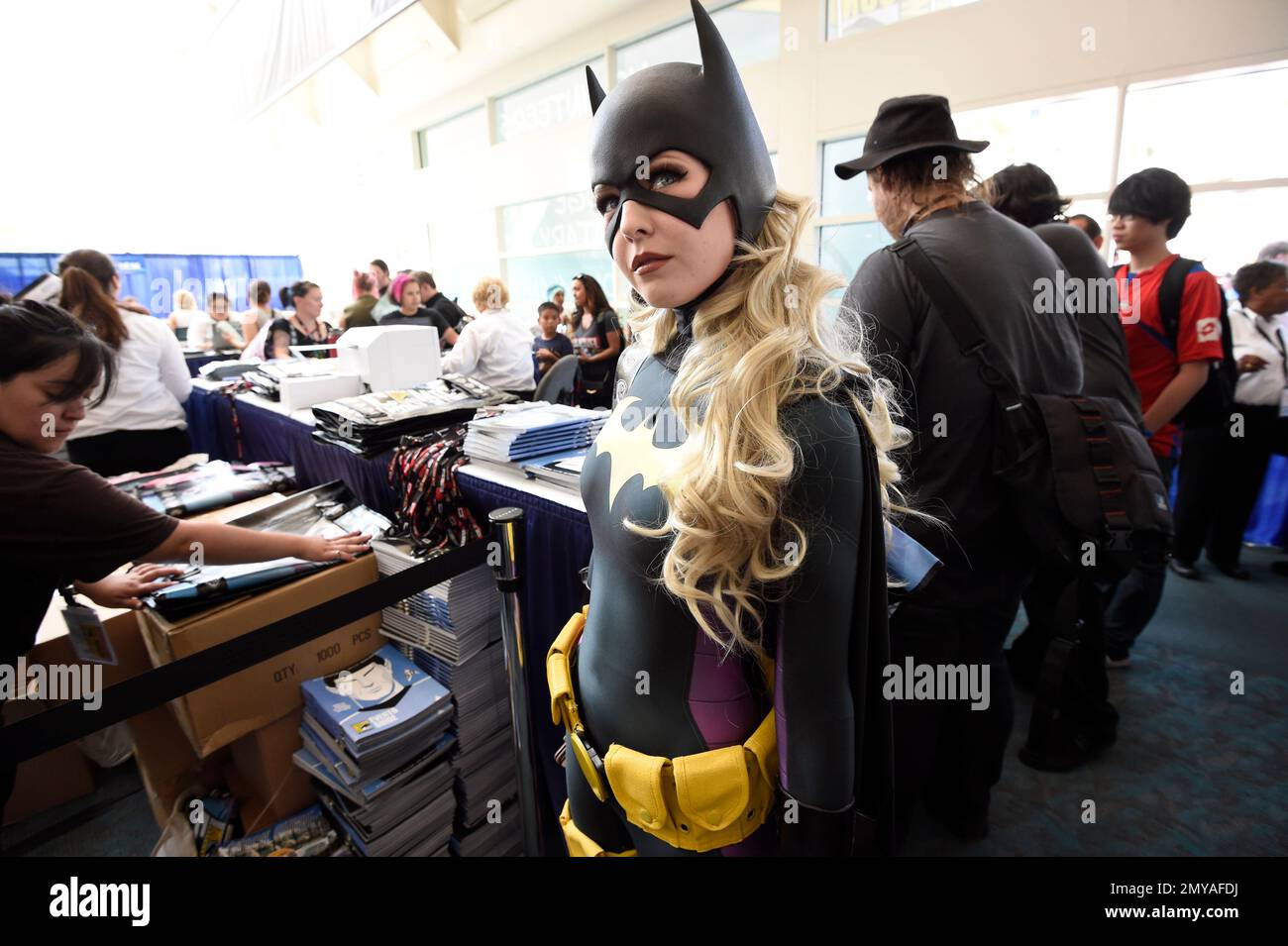 Jessica Chancellor, dressed as Batgirl, waits in line for her ...