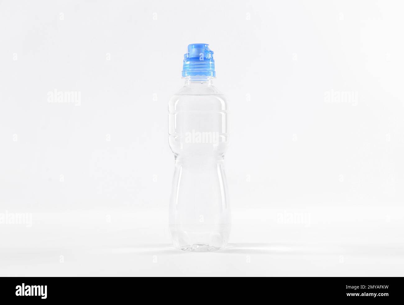 Plastic bottle of pure water isolated on white Stock Photo - Alamy