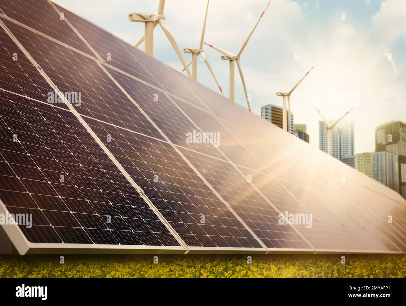 Solar panels and wind turbines installed outdoors. Alternative energy ...