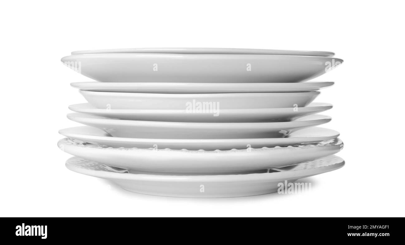 Stack of clean plates isolated on white Stock Photo - Alamy