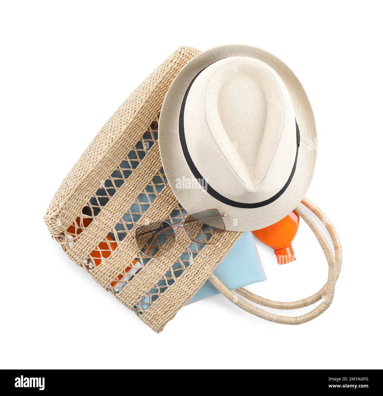 Bag with beach objects on white background, top view Stock Photo - Alamy