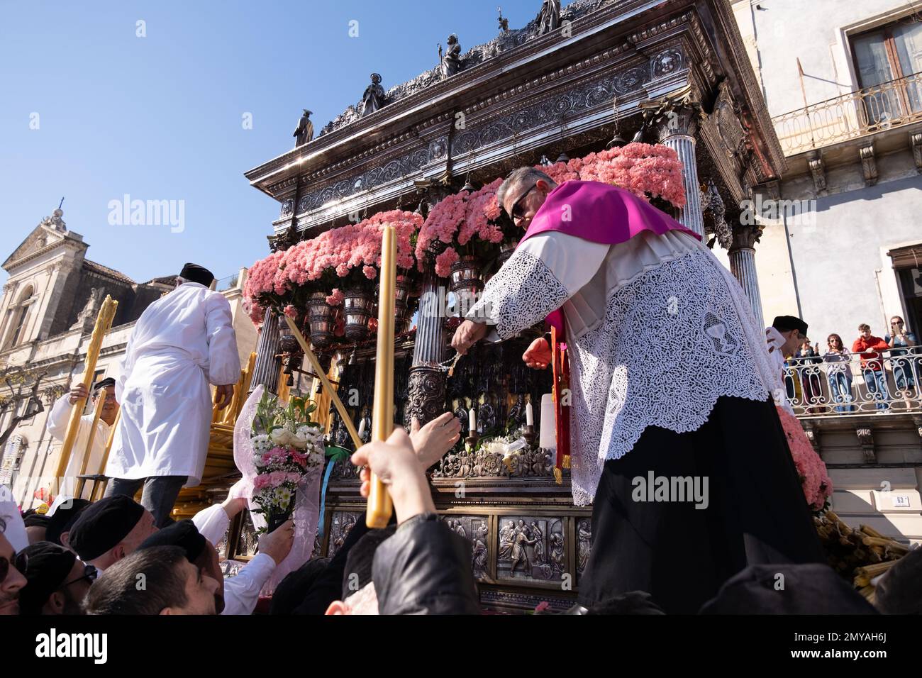 The procession with the relics of Saint Agatha seen on the street of ...