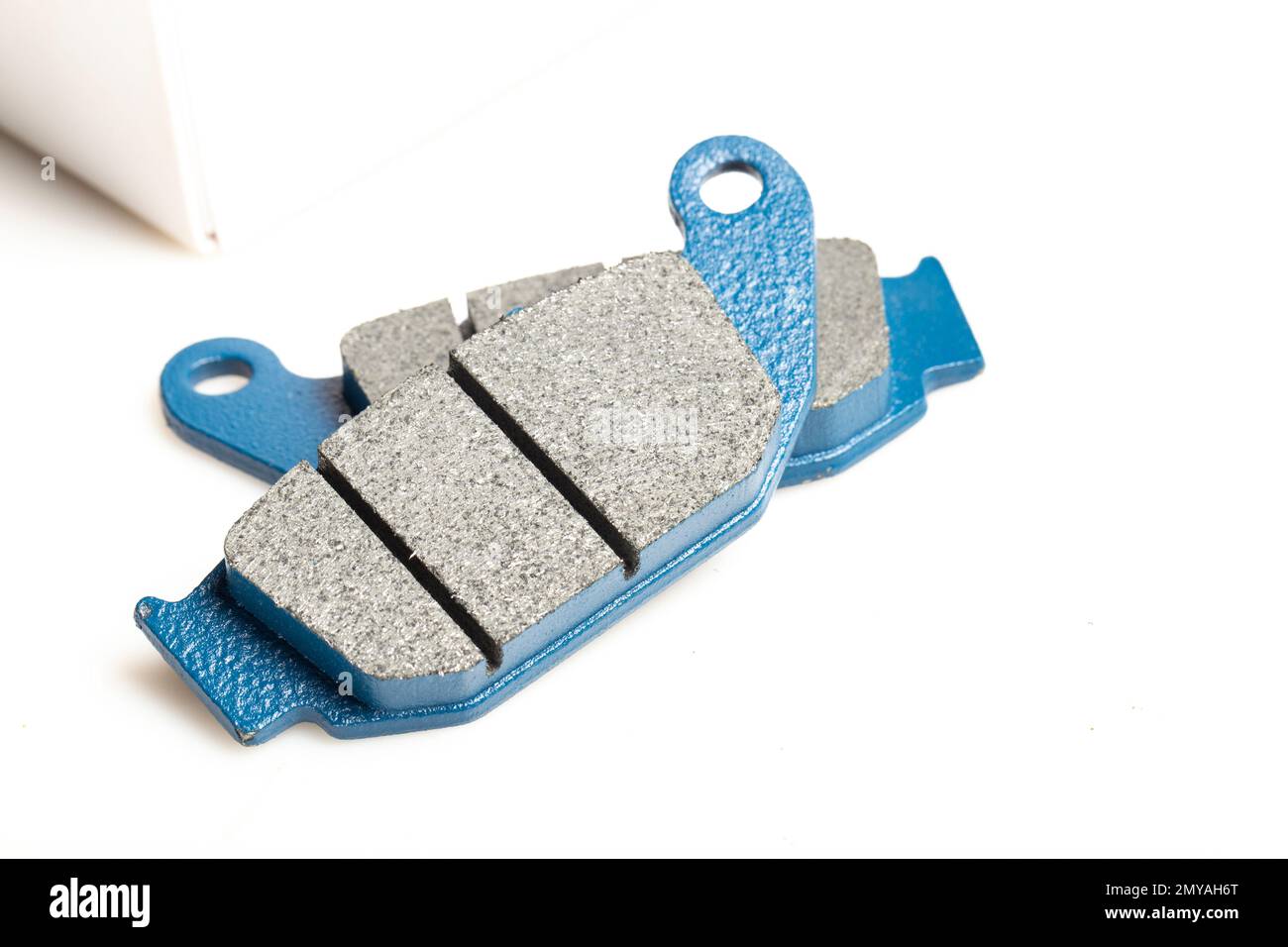Motorcycle brake pads isolated on white background Stock Photo - Alamy