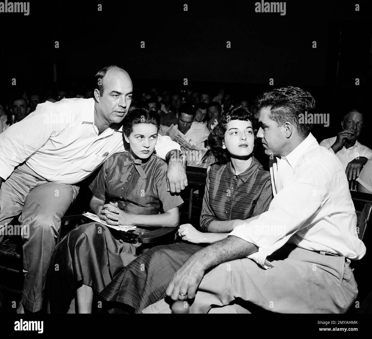 J.W. Milam, left, and Roy Bryant, right, sit with their wives in the ...