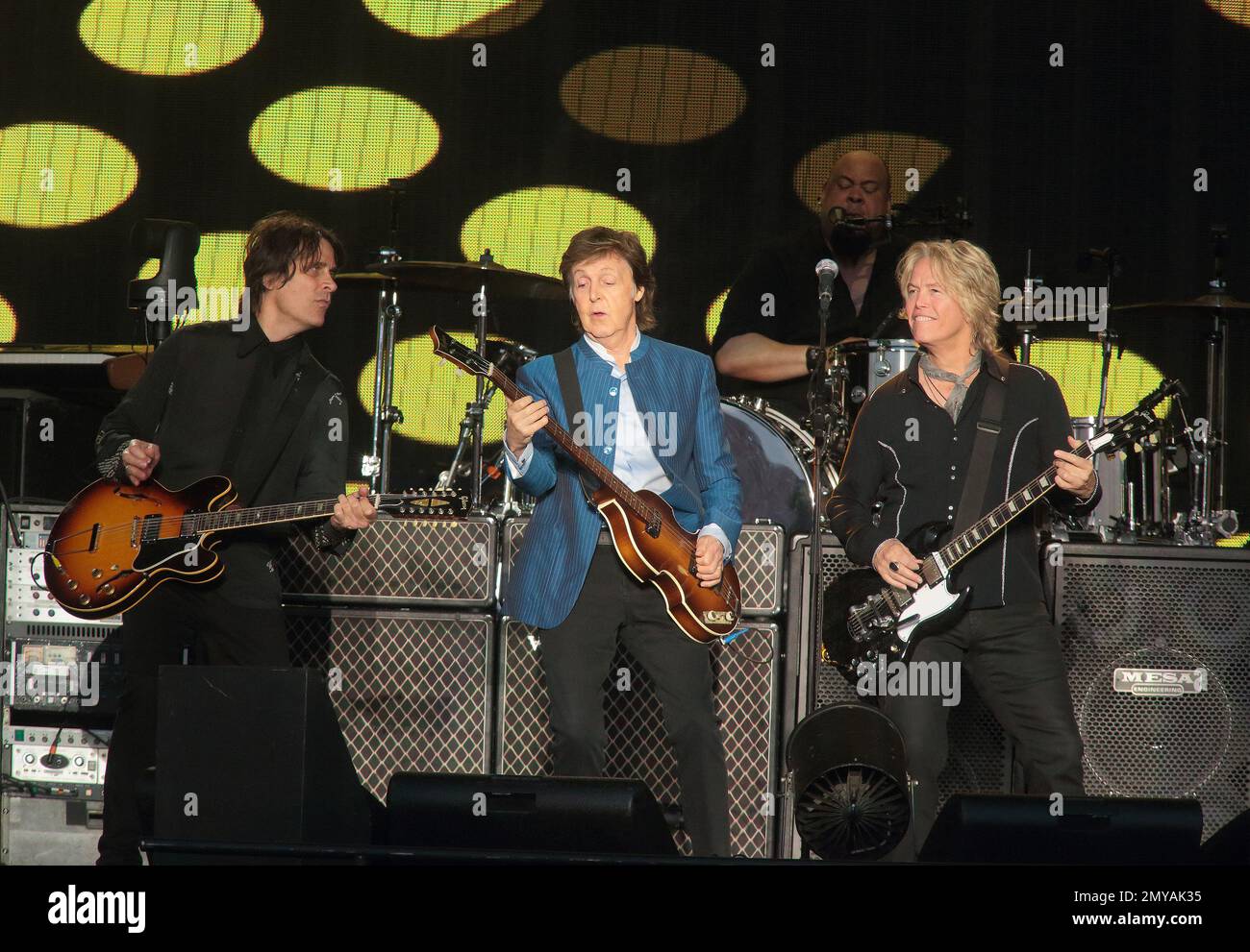 Rusty Anderson, from left, Paul McCartney and Brian Ray perform in ...