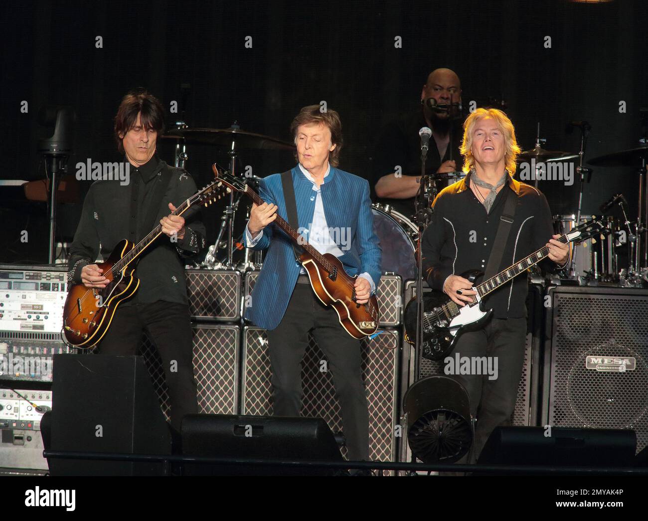 Rusty Anderson, from left, Paul McCartney and Brian Ray perform in ...