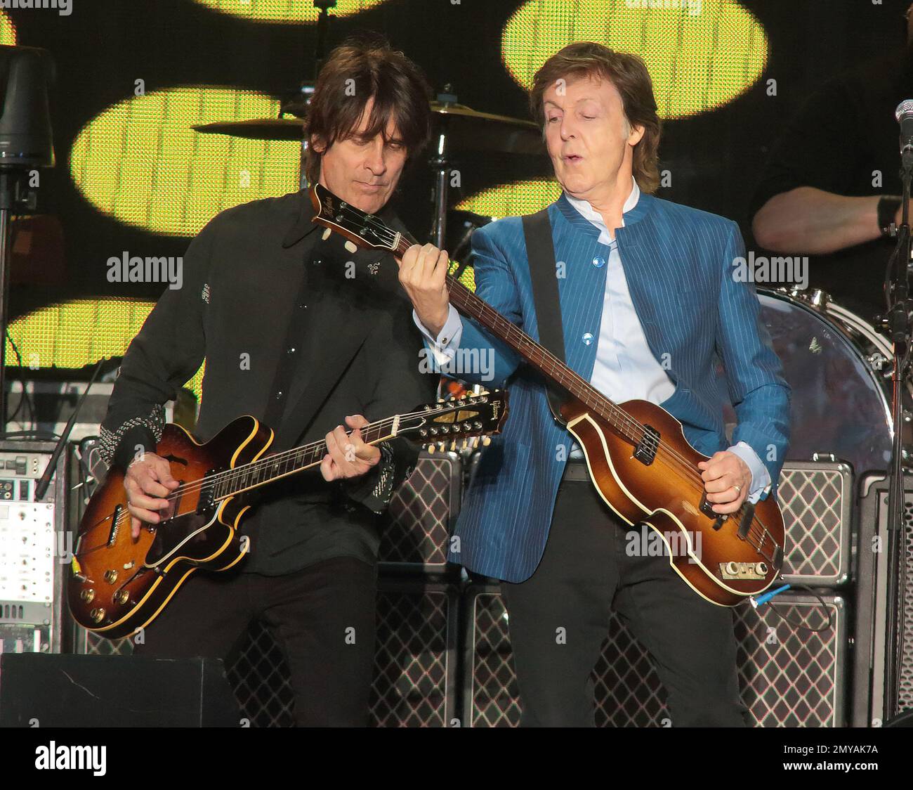 Rusty Anderson, left, and Paul McCartney perform in concert at ...