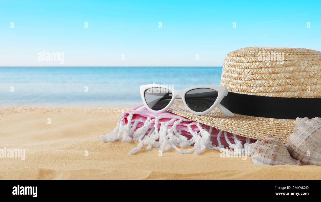 Beach objects on sand near sea, space for text. Summer vacation Stock ...