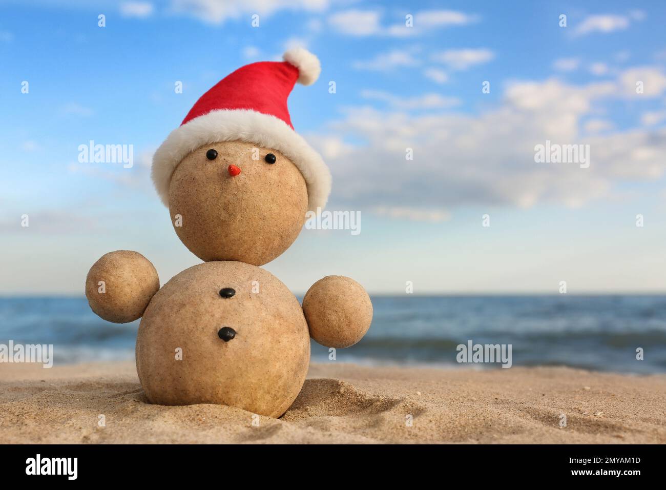 Snowman made sand on beach hi-res stock photography and images - Alamy