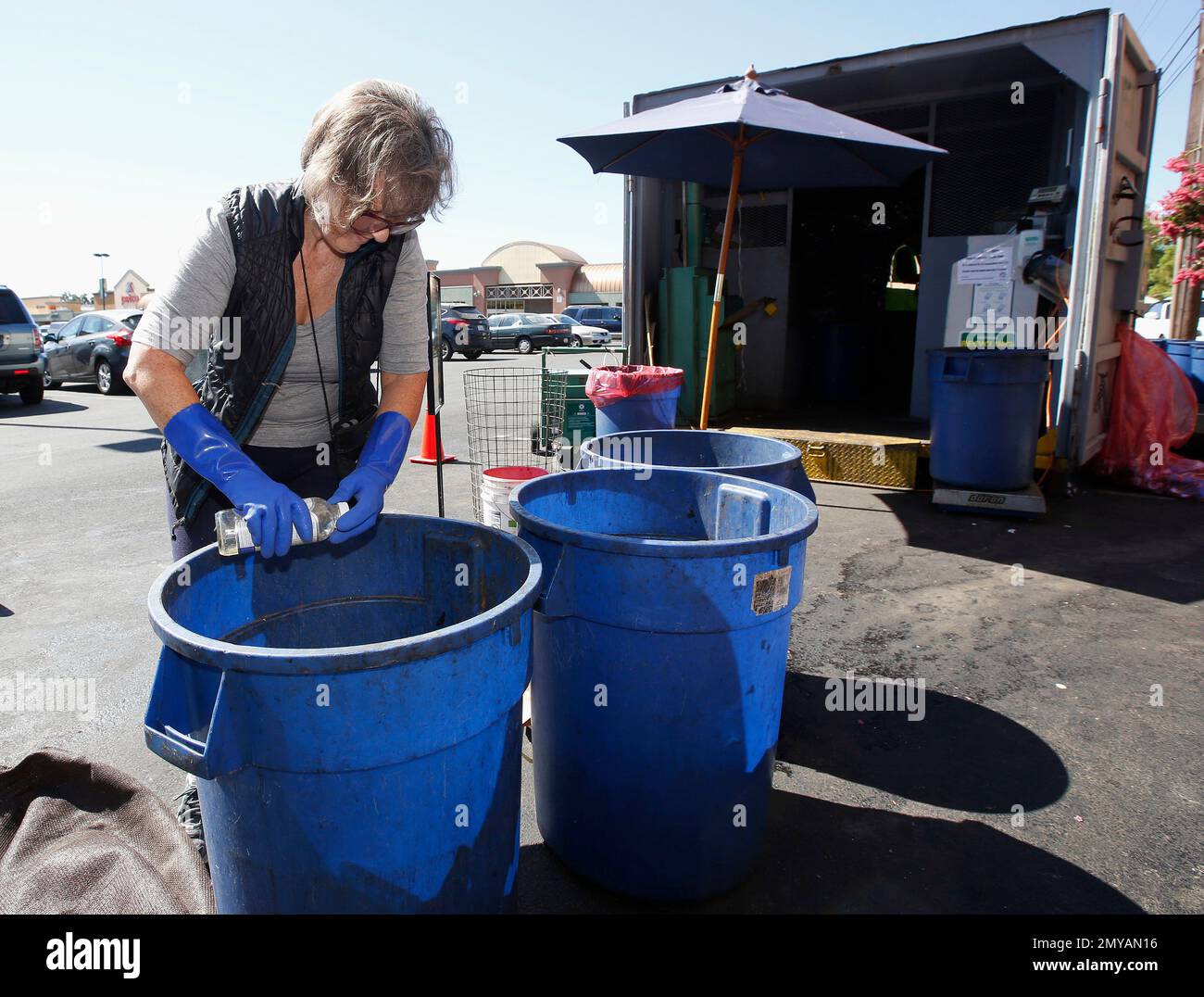 In this photo taken Tuesday, July 5, 2016 Claudette Cole places a ...