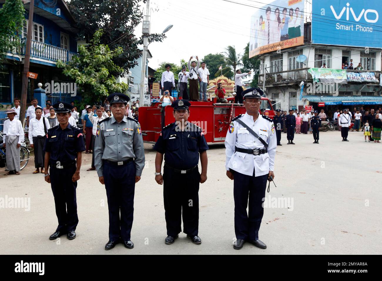 Police pay respect at the tomb of Gen. Aung San during a ceremony to ...