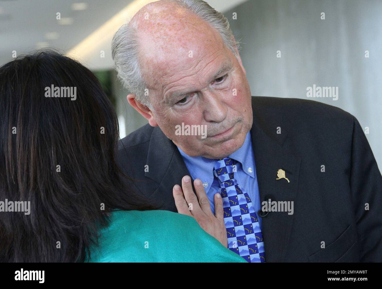 Alaska Gov. Bill Walker speaks to his communications director, Grace ...