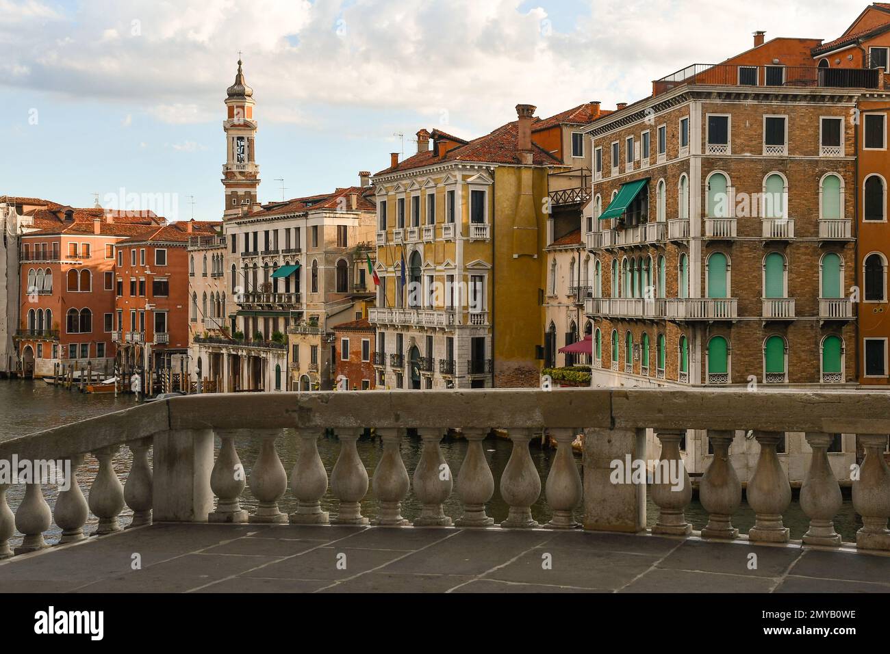 The Rialto Bridge empty at dawn with Palazzo Civran and the bell tower ...