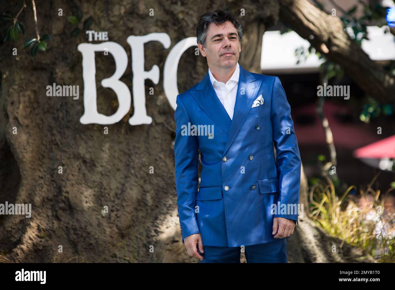 Jonathan Holmes poses for photographers upon arrival at the premiere of ...