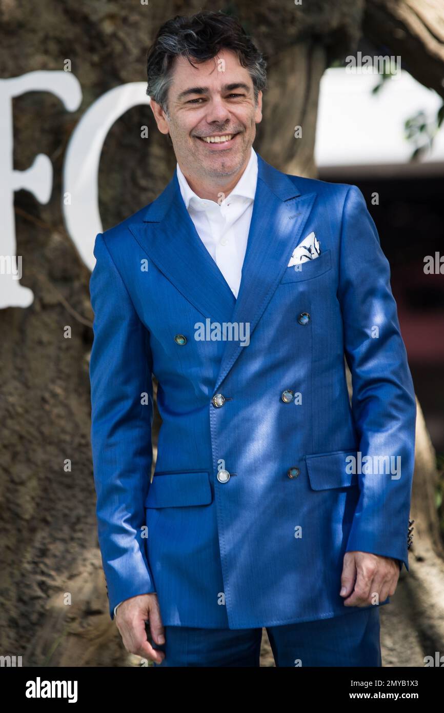 Jonathan Holmes poses for photographers upon arrival at the premiere of ...
