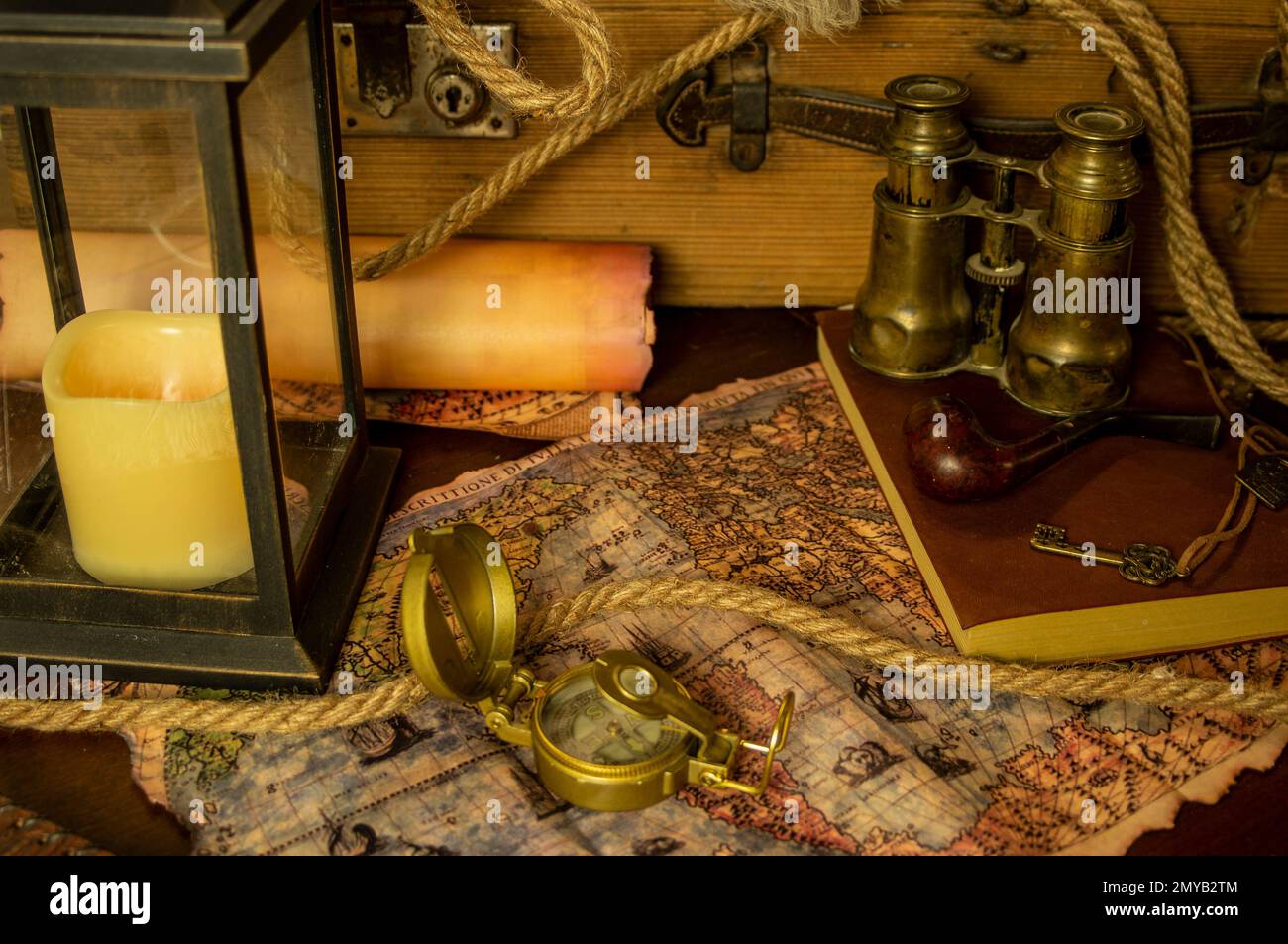 Antique adventure scroll background on adventurer table Binoculars ...