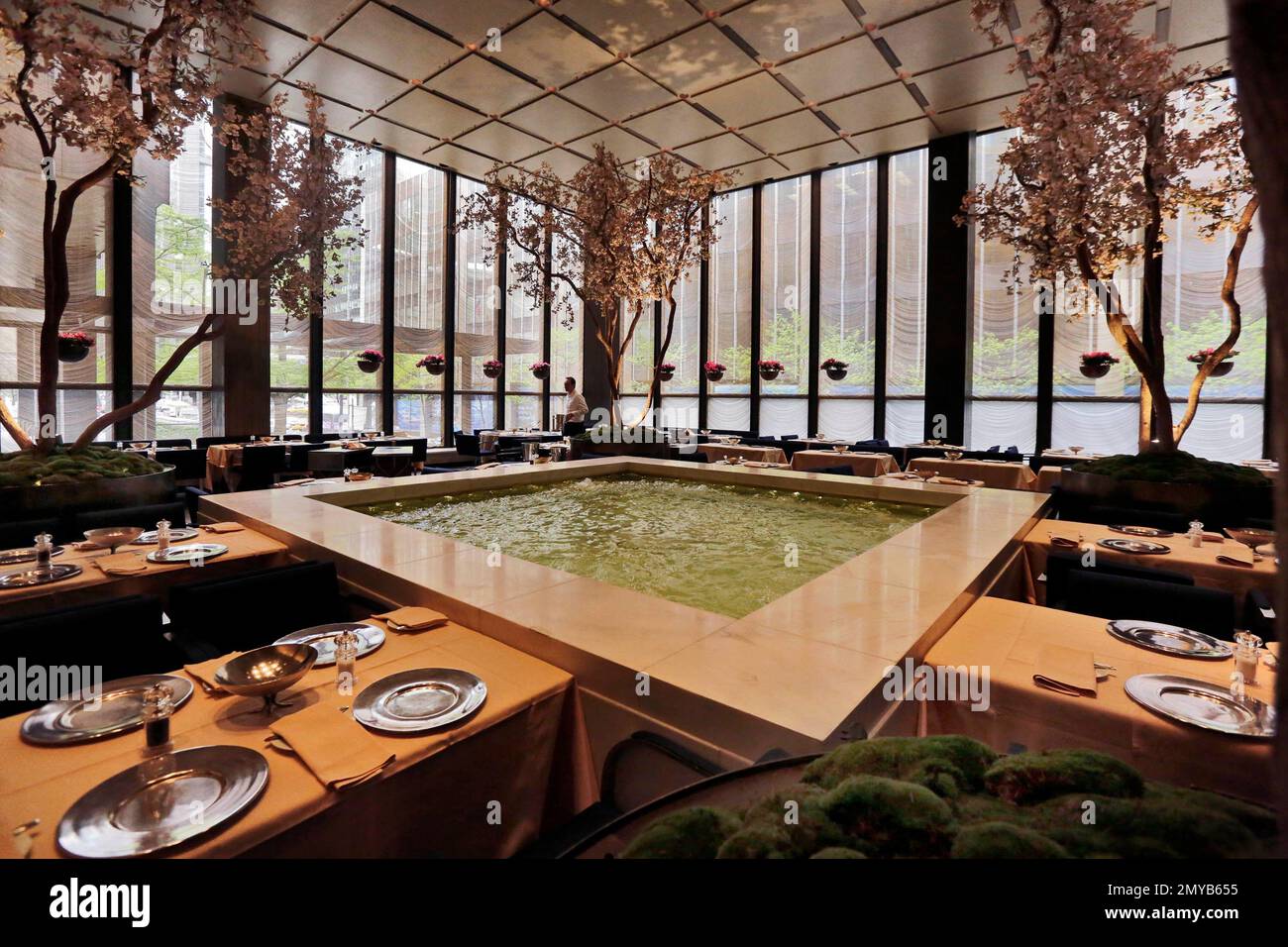 FILE - In this April 29, 2016 file photo, spring blossoming trees adorn ...