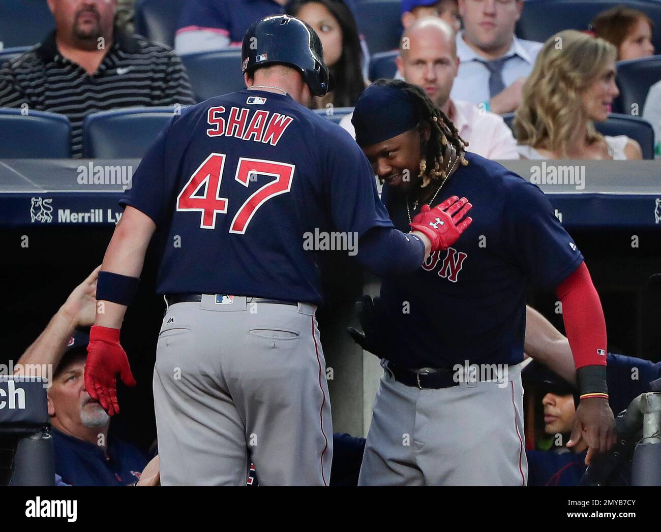 Boston Red Sox's Travis Shaw (47) celebrates with Hanley Ramirez after ...