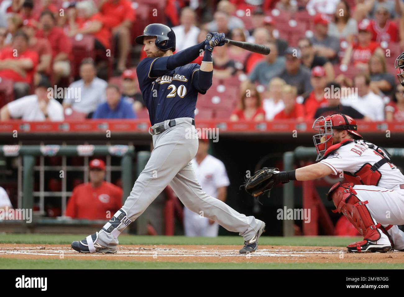 Milwaukee Brewers' Jonathan Lucroy watches his RBI sacrifice fly off ...