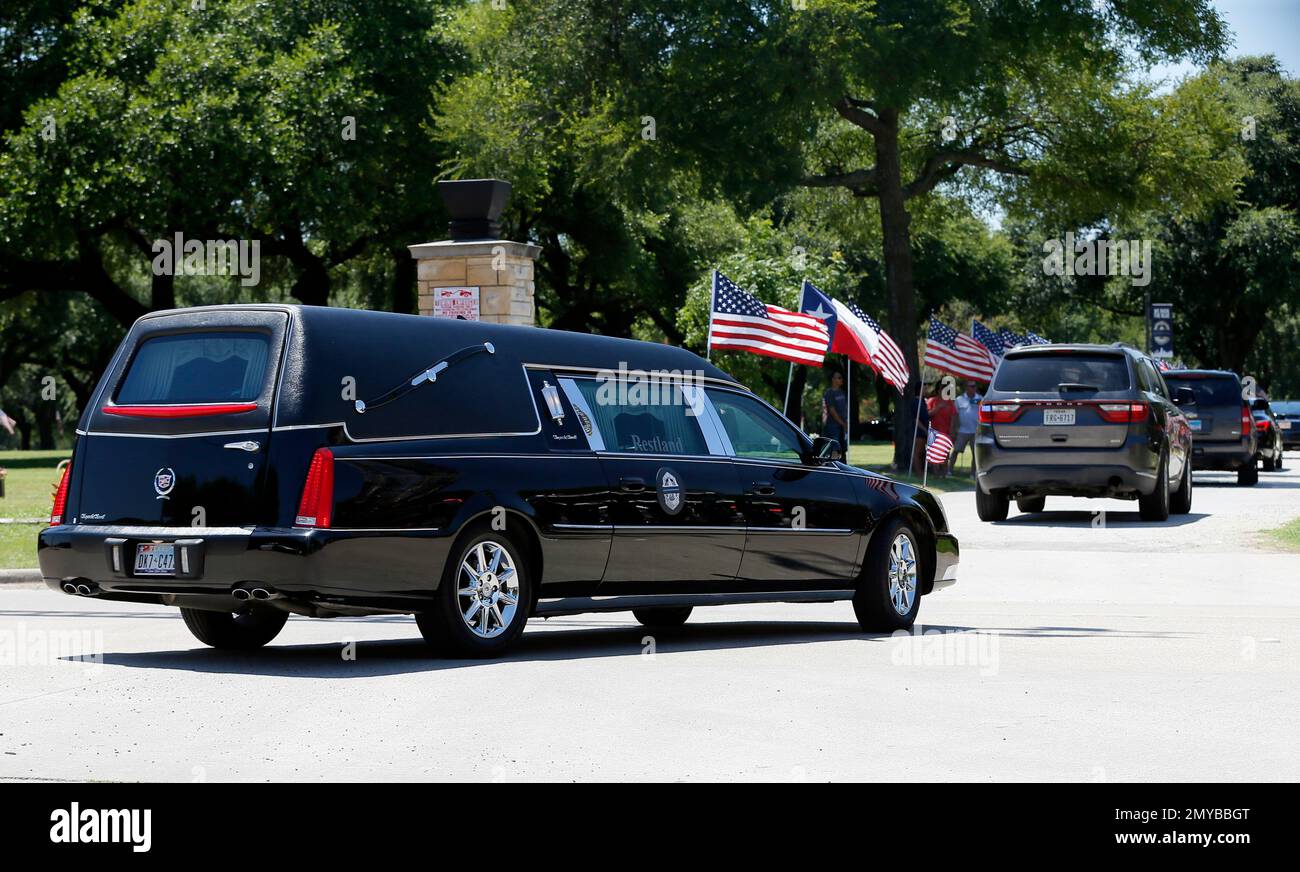 The hearse carrying Dallas police Sgt. Michael Smith arrives at ...