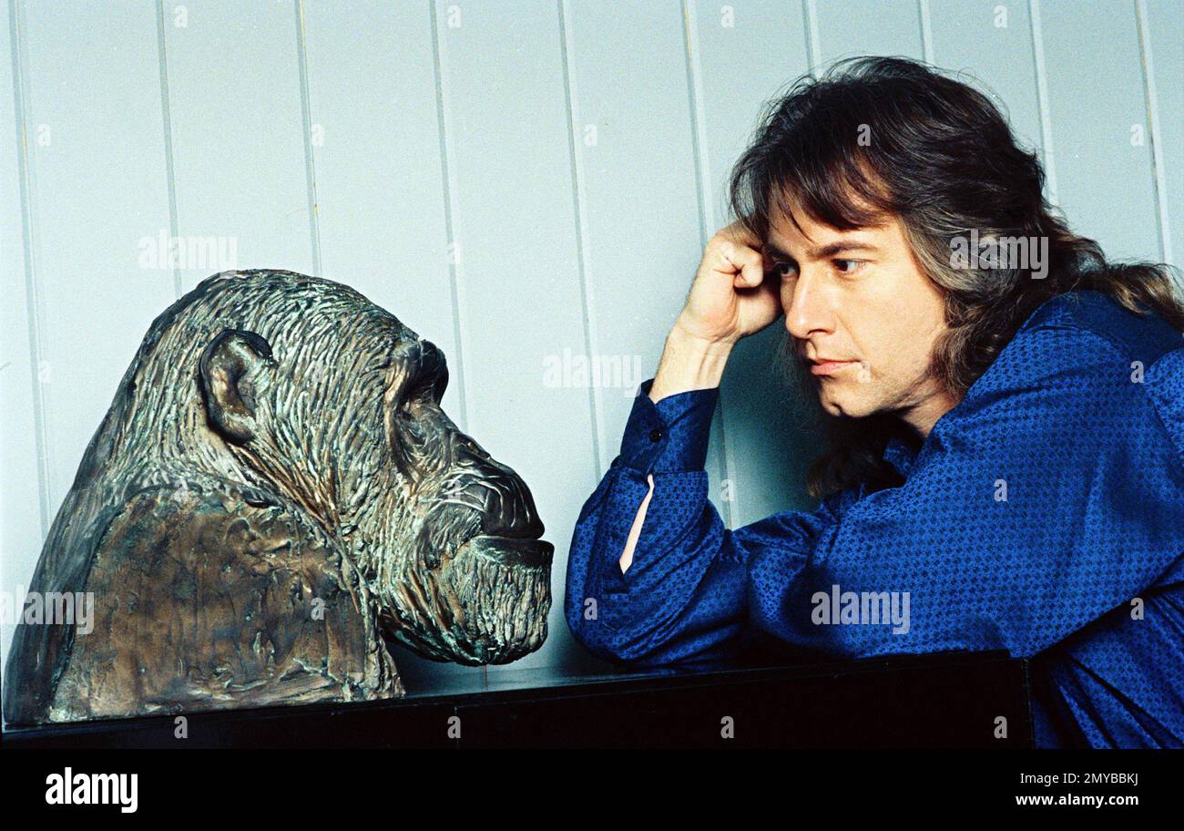 Special effects makeup artist, Rick Baker, poses with a model of his ...