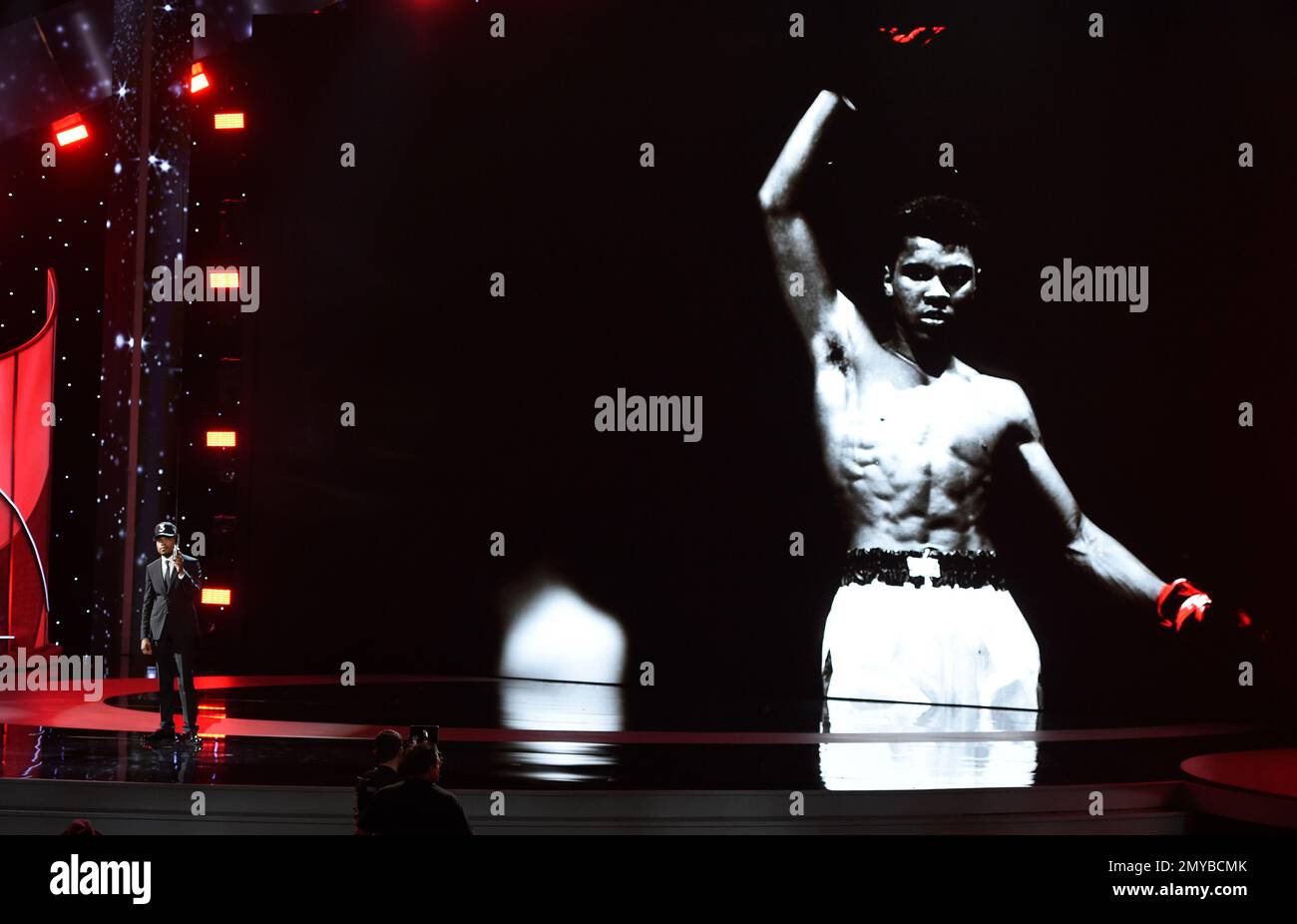 With Muhammad Ali pictured on screen, Chance the Rapper performs at the ...