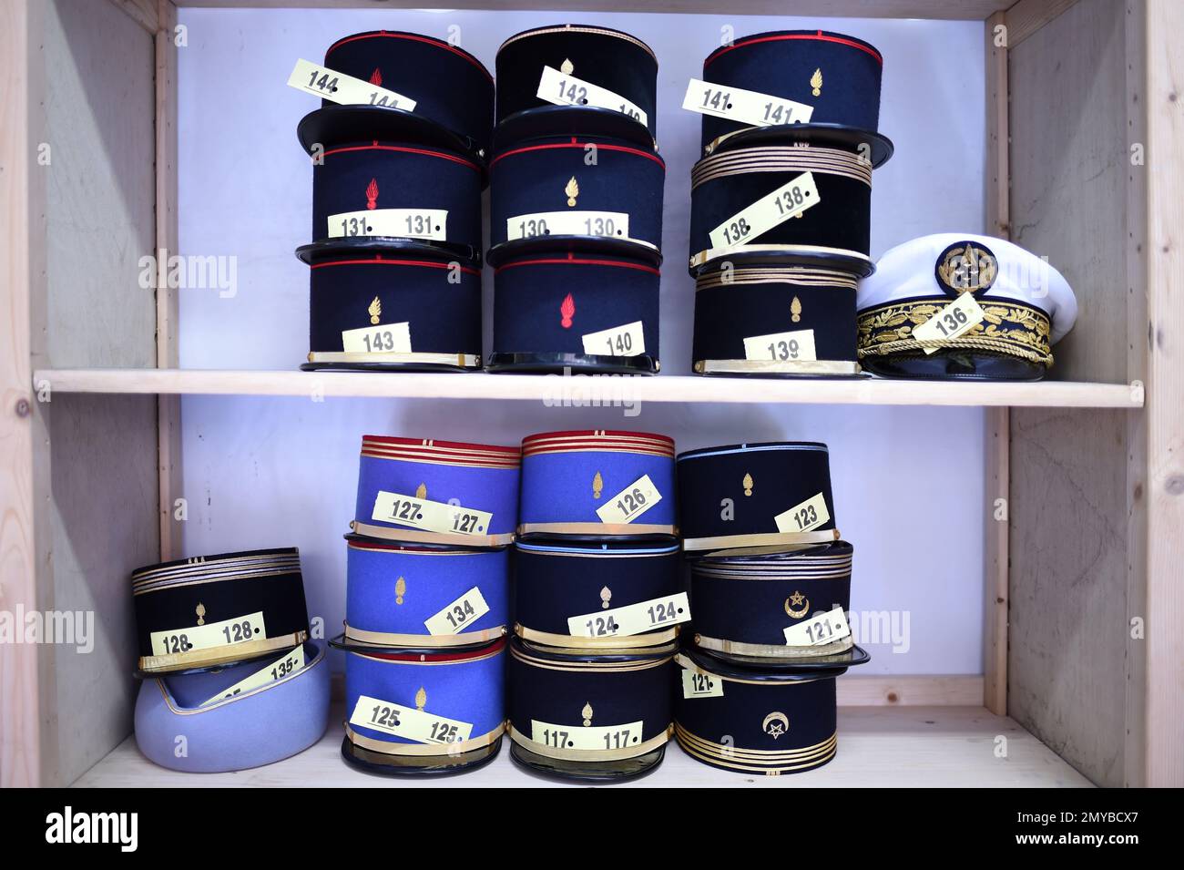 Different types of French military caps in a cloakroom at the Defense ...