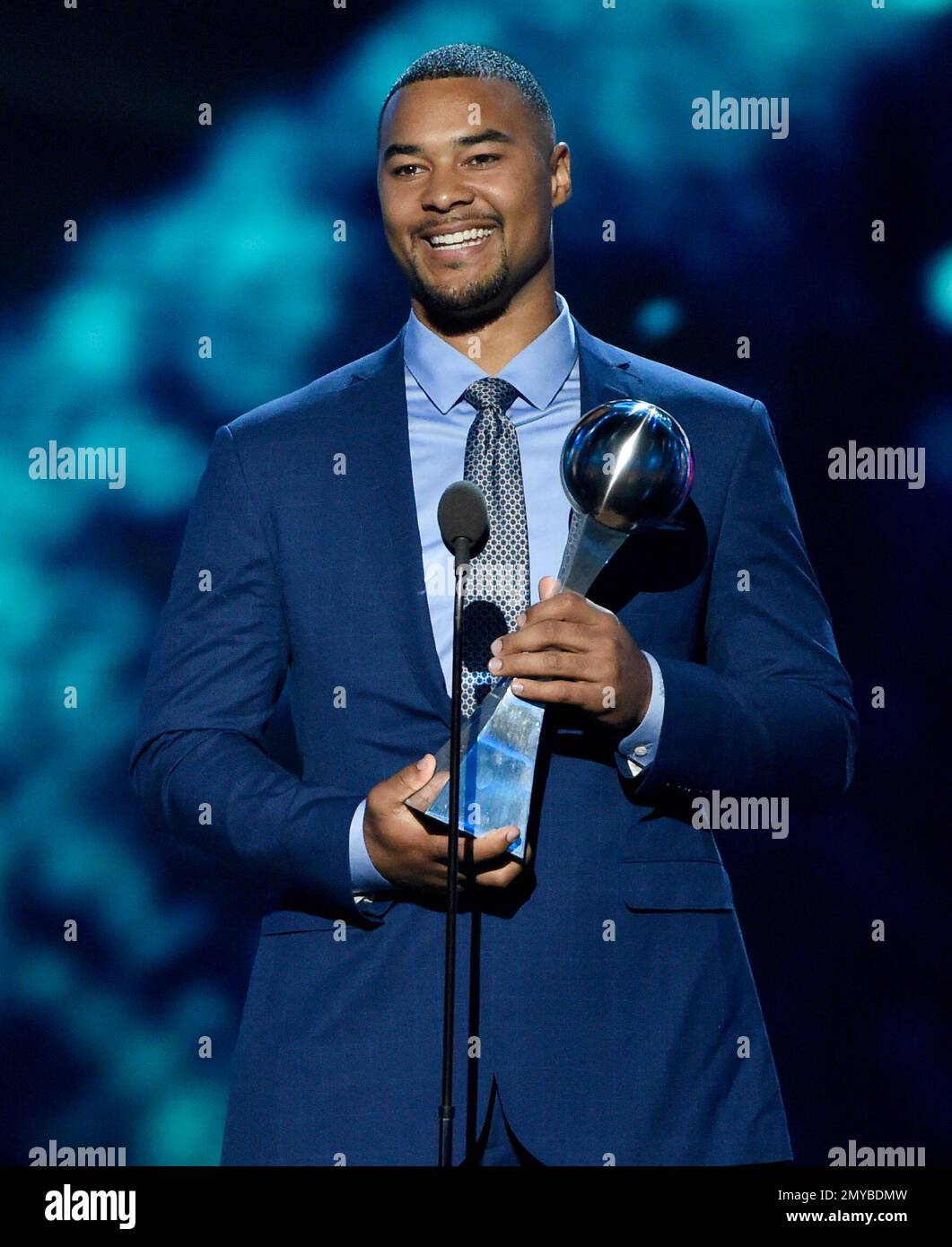 NFL football player Richard Rodgers, of the Green Bay Packers, accepts ...