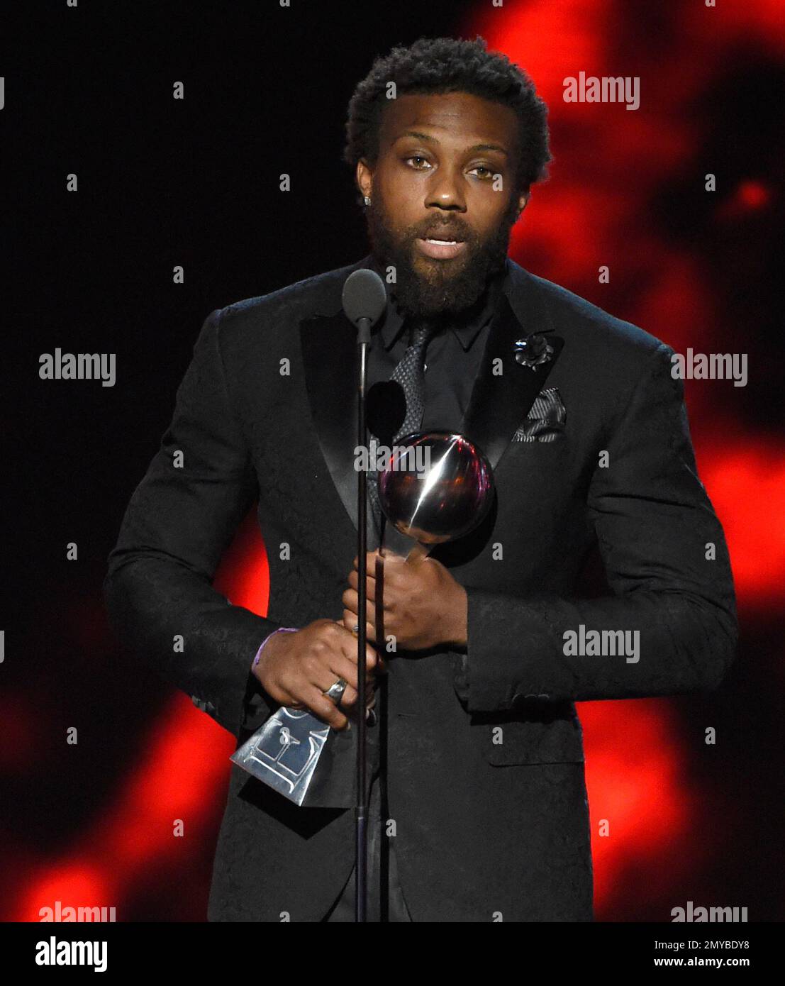NFL football player Eric Berry, of the Kansas City Chiefs, accepts the ...