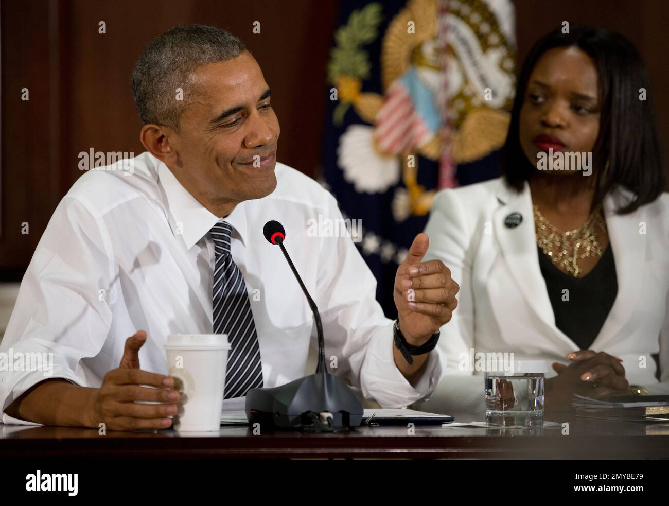 President Barack Obama, joined by Brittany Packnett, of the President's ...