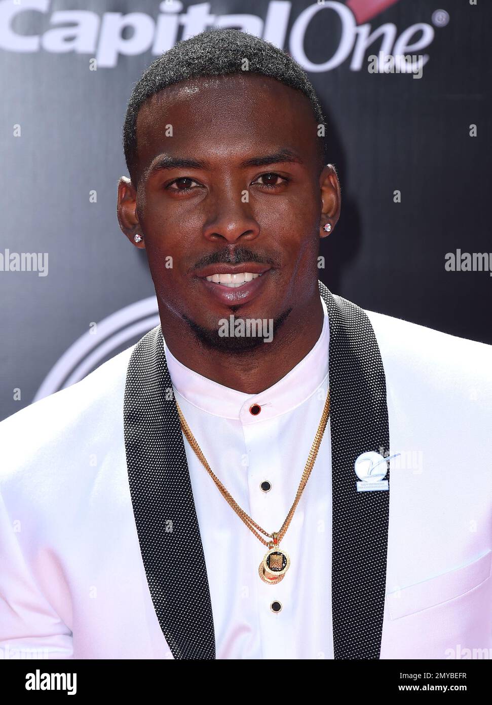 NFL player Andrew Hawkins, of the Cleveland Browns, arrives at the ESPY ...