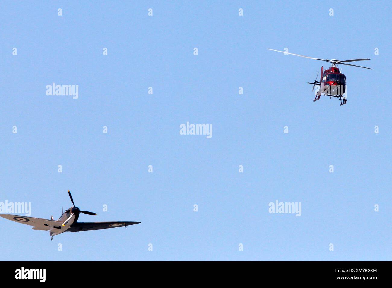 A fighter plane in the air over the beach during filming a scene for ...