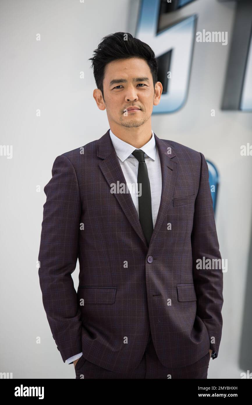 US actor John Cho poses for photographers upon arrival at the premiere ...