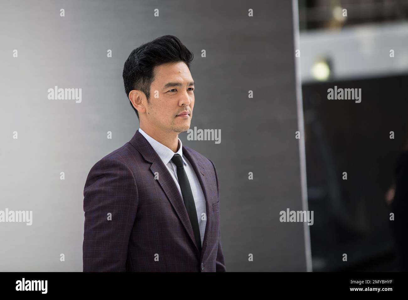 US actor John Cho poses for photographers upon arrival at the premiere ...