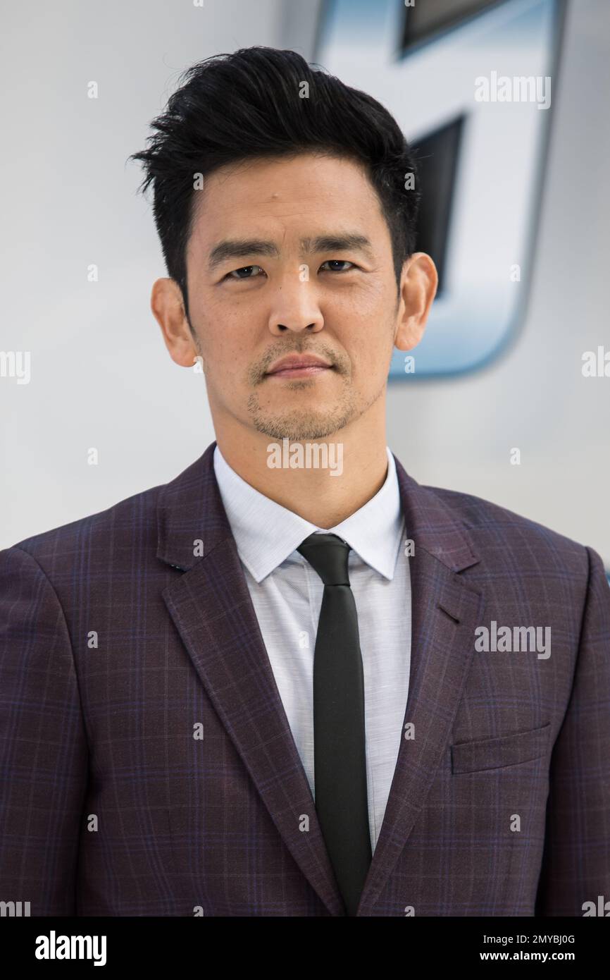 US actor John Cho poses for photographers upon arrival at the premiere ...
