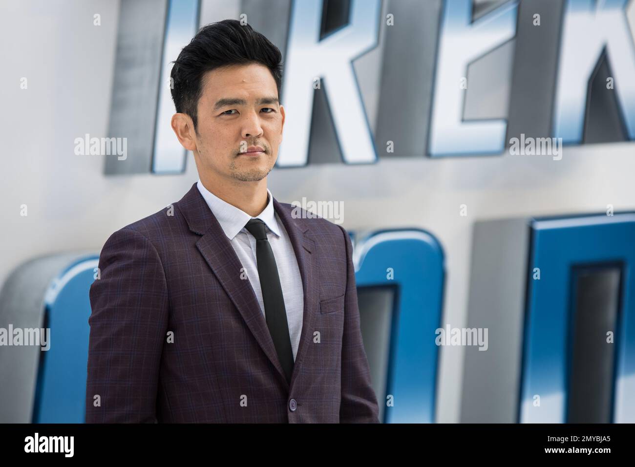US actor John Cho poses for photographers upon arrival at the premiere ...