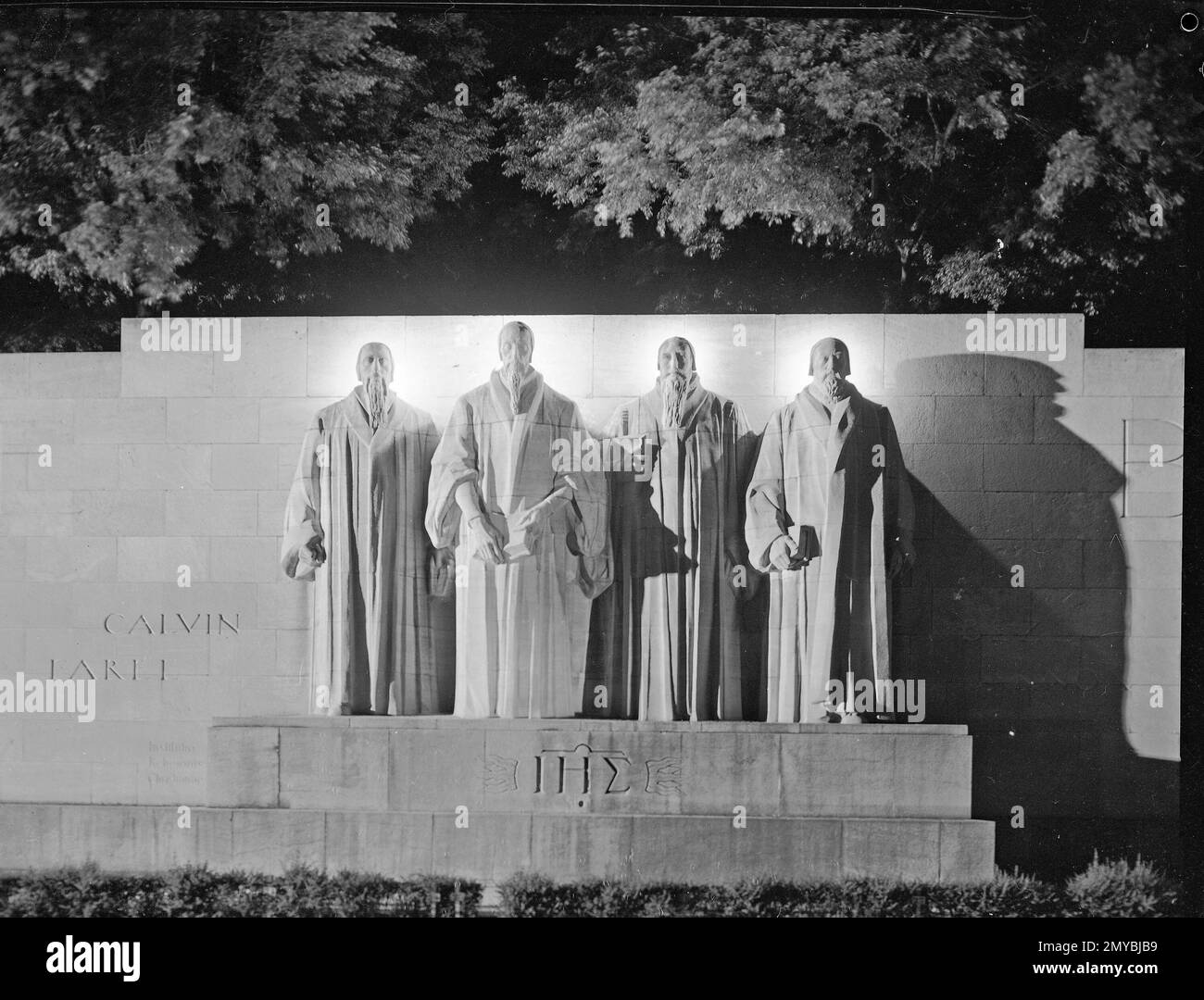At the center of the Reformation Wall monument in Geneva, statues of ...