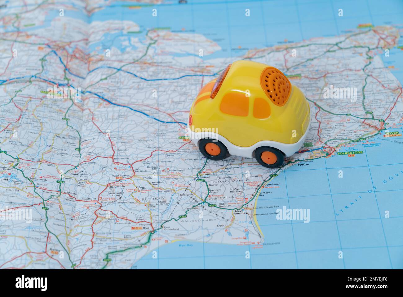 Toy car driving road map hi-res stock photography and images - Alamy