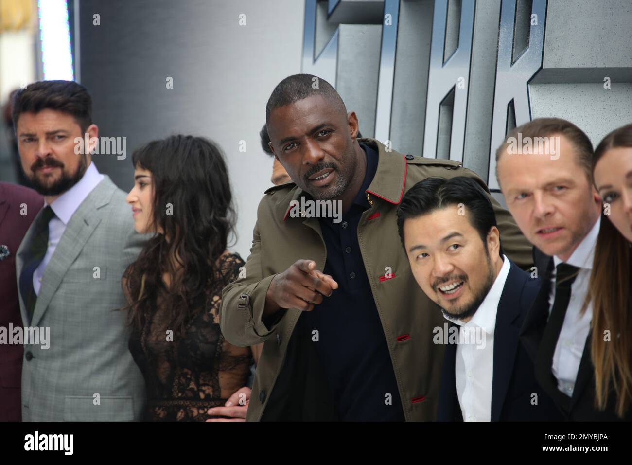 Actor Idris Elba, centre, poses for photographers with the rest of the ...