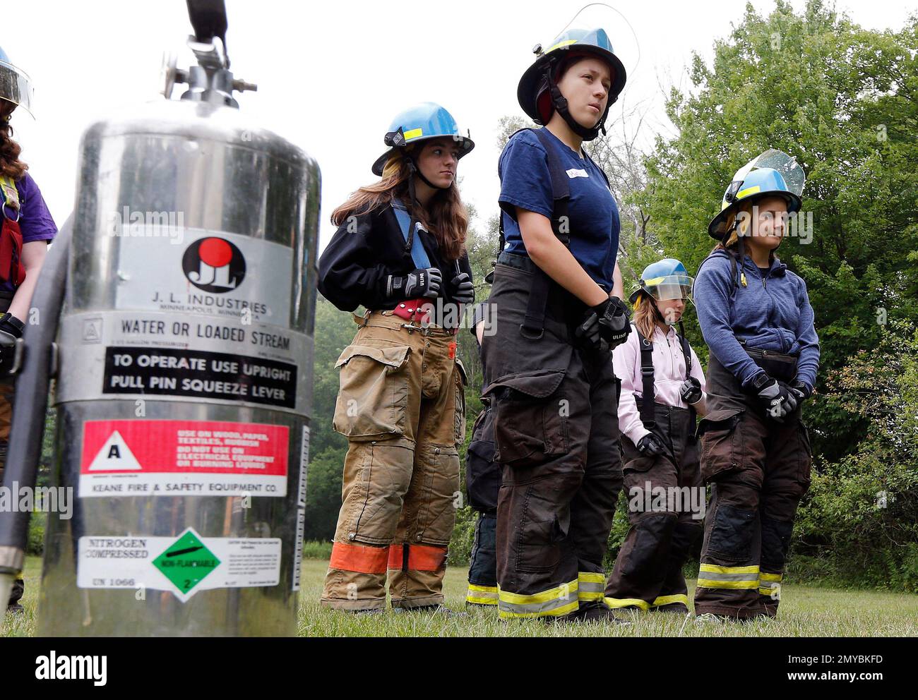 In this Monday, July 11, 2016 photo, firefighting camp participants ...